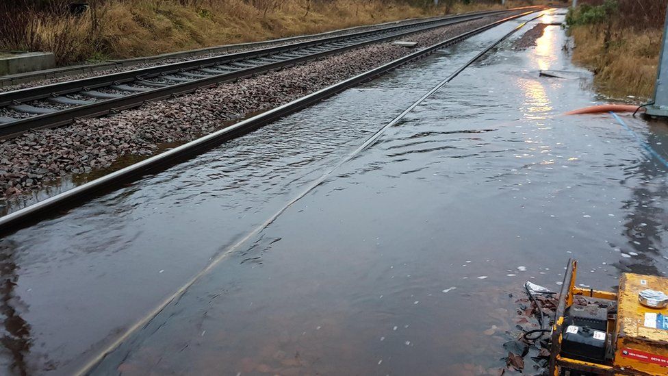 Severe flooding disrupts trains and trams in parts of Scotland - BBC News