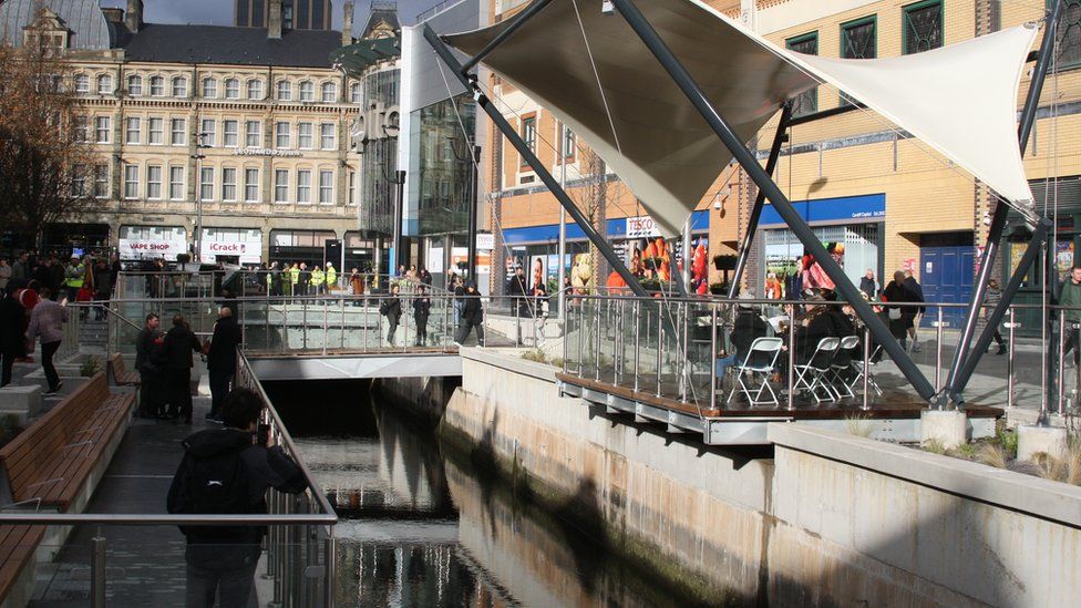 Cardiff canal hidden for 70 years uncovered in city centre - BBC News