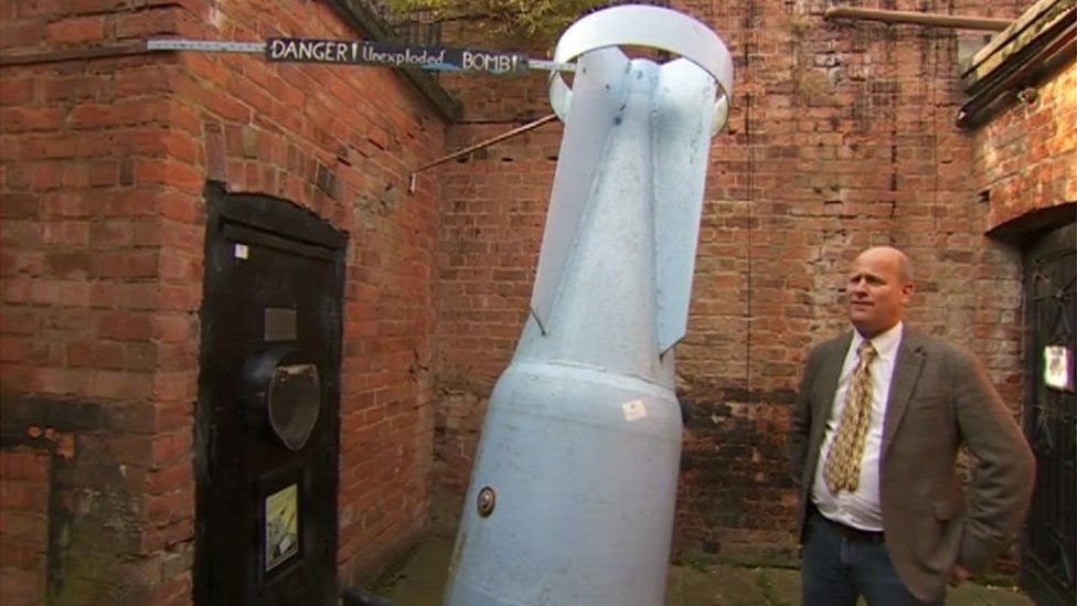 Aircraft, bomb and skeleton in eclectic Fort Paull auction - BBC News