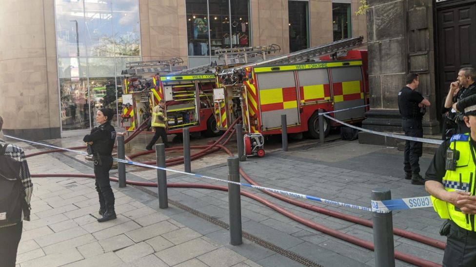 Trinity Leeds fire sees shopping centre evacuated - BBC News