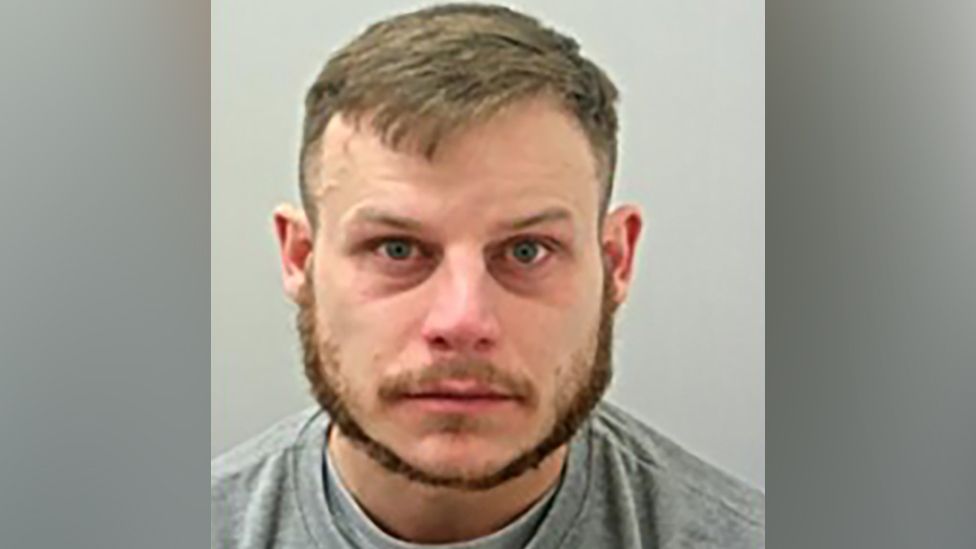 Blackburn man who murdered stranger on her doorstep jailed - BBC News