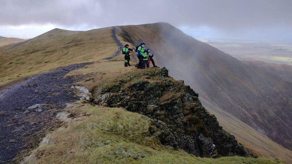 Lancaster boy, six, climbing 12 mountains in charity bid - BBC News