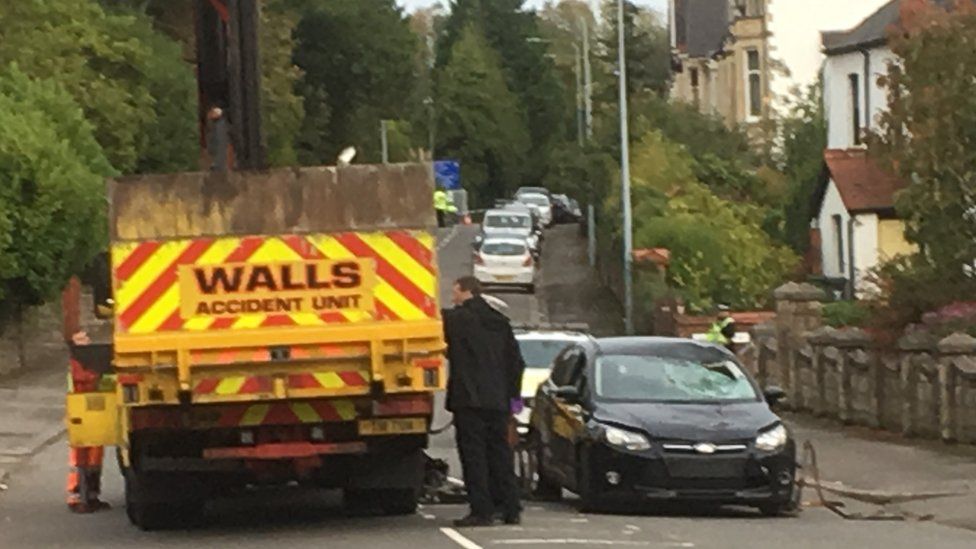 Cardiff cyclist, 54, dies following crash with car - BBC News