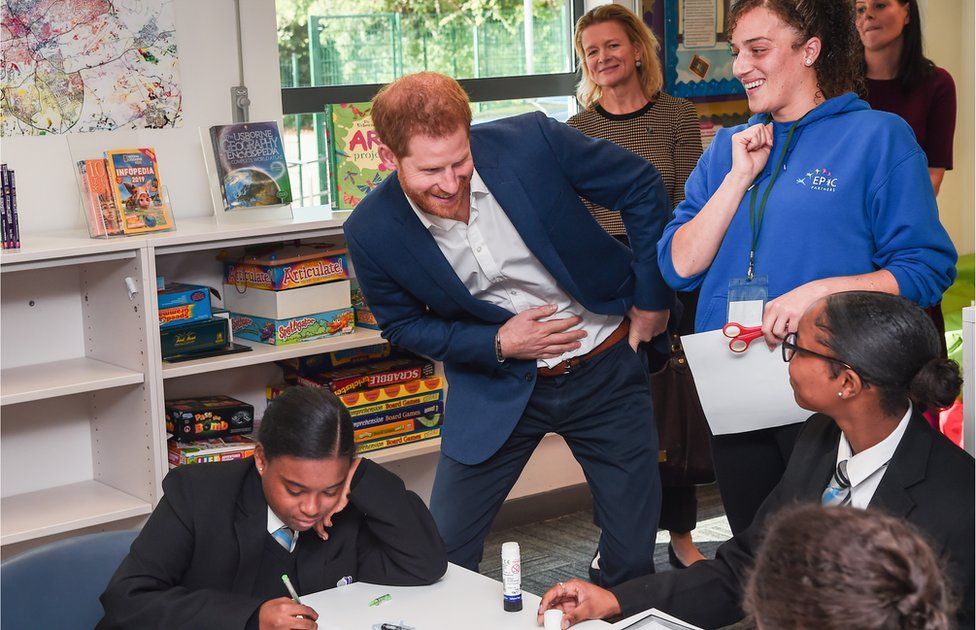 Prince Harry questions future of exams during school visit - BBC News