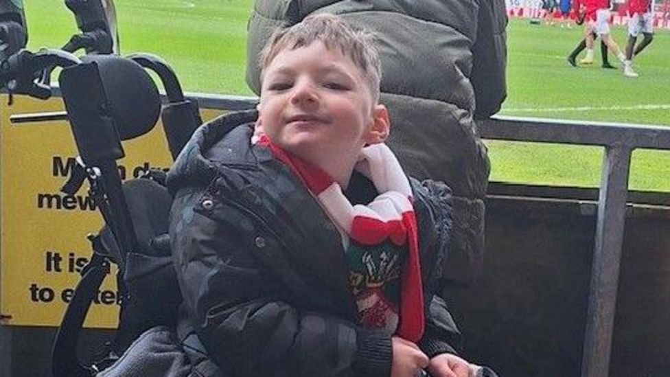 Wrexham family hit £40,000 fundraising total for disabled son - BBC News