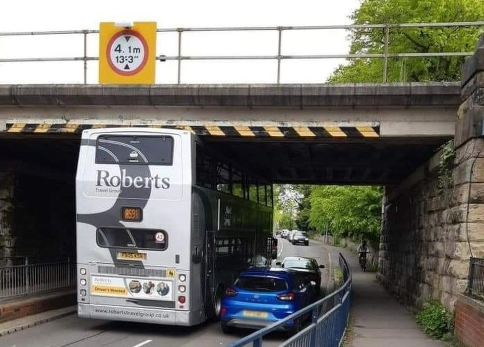 School bus gets stuck under low bridge again - BBC News