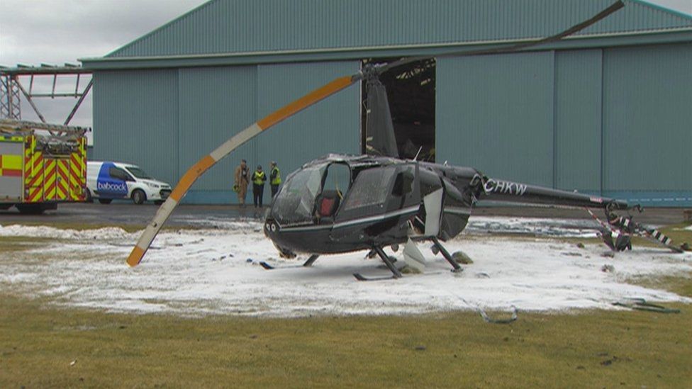 Helicopter accident at Perth Airport - BBC News