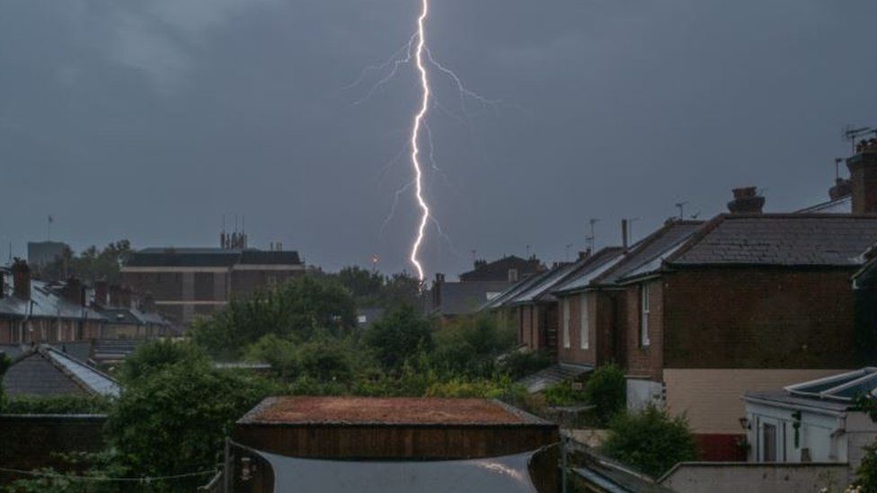 Lightning destroys roofs as storms end heatwave in southern England and ...