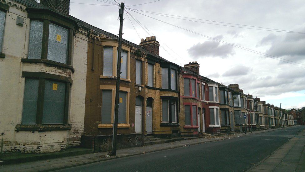 The last woman left on a derelict street - BBC News