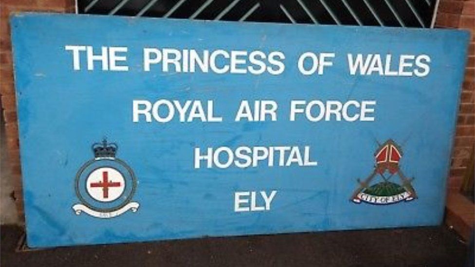 RAF cadets chip in to bring lost Ely hospital sign back - BBC News