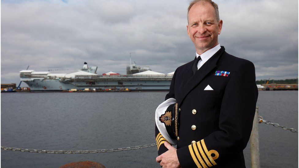 Captain takes control of Navy's latest aircraft carrier - BBC News