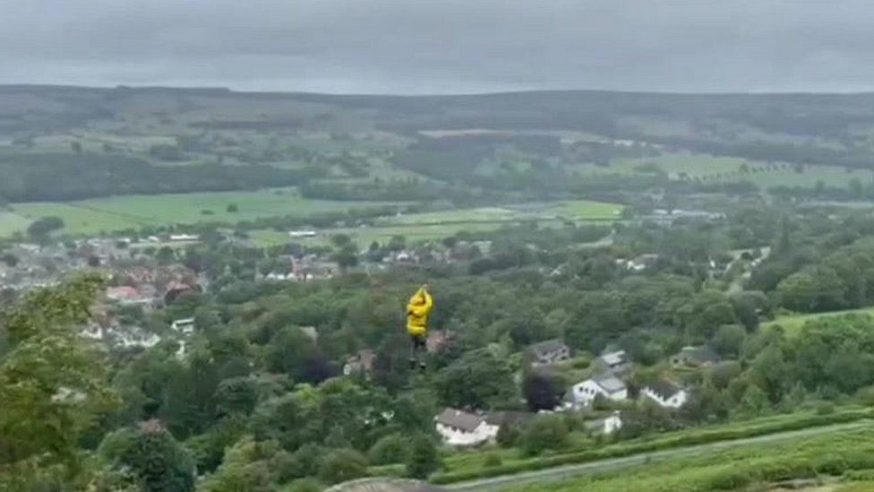 Ilkley zip wire event raises £50k for West Yorkshire hospices - BBC News