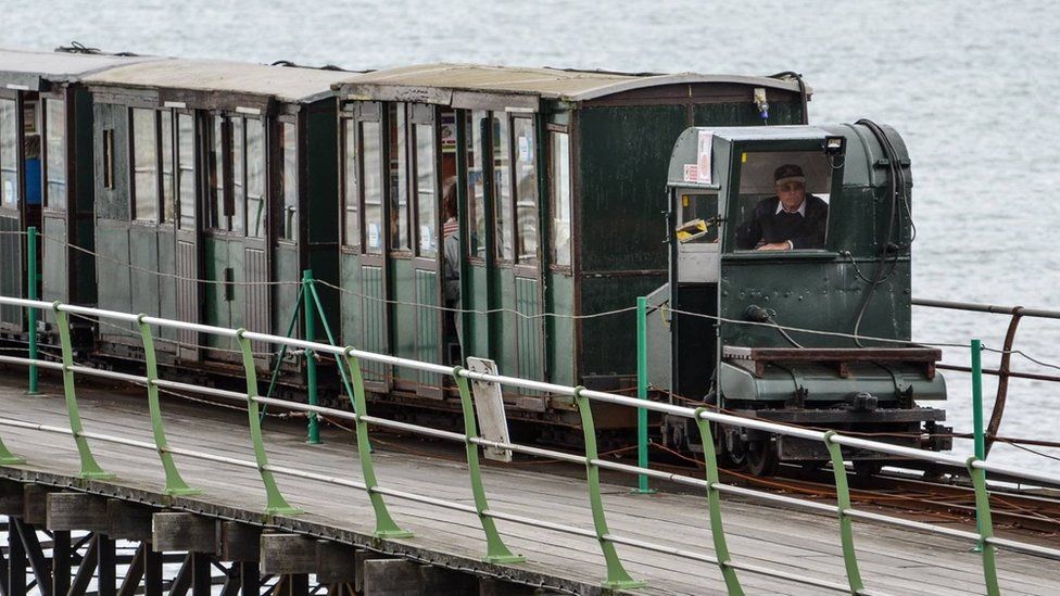 Campaigners mark centenary of Hythe Pier electric locos - BBC News
