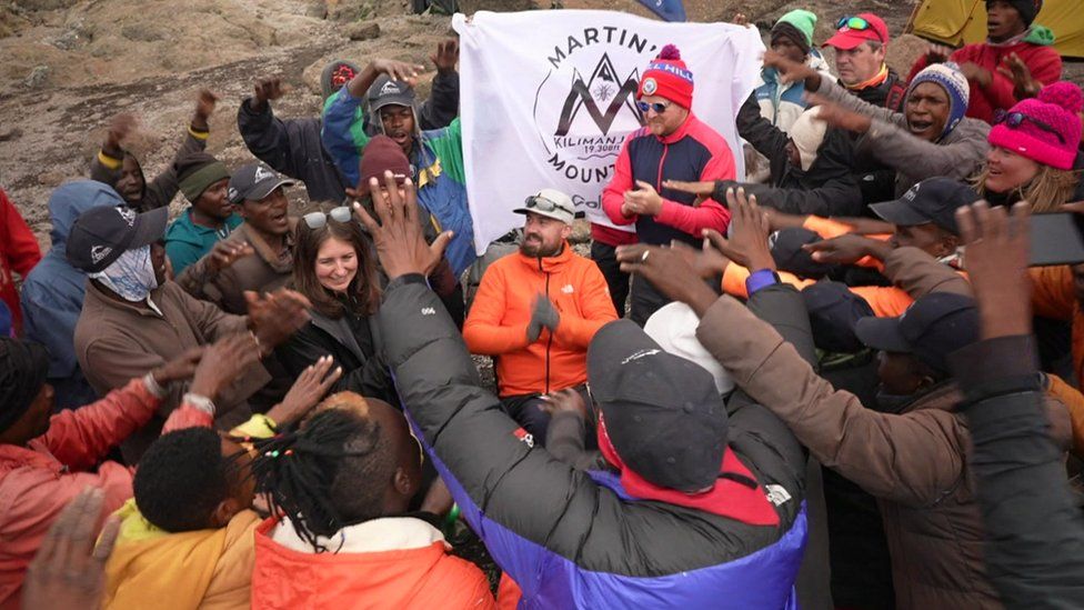 Manchester Arena bomb survivor completes Kilimanjaro challenge - BBC News