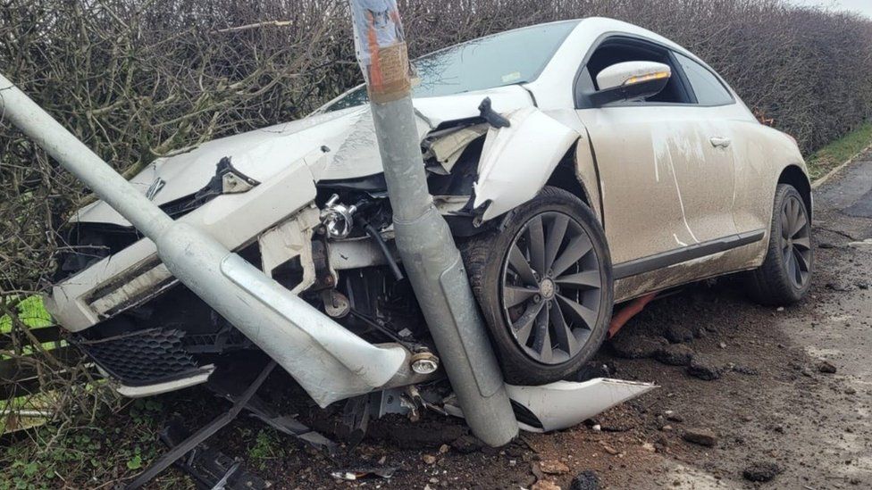 Four arrested after stolen car crashes into lamppost - BBC News
