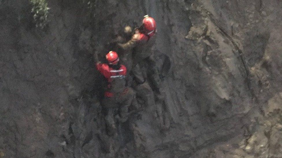 Two rescued from mud bank near Bristol city centre - BBC News