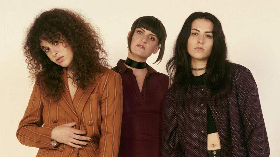 Meet Muna: The 'queer pop' band who caught Harry Styles's eye - BBC News