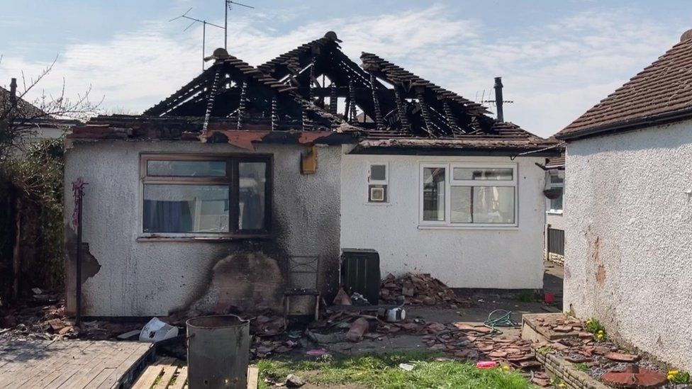 Dad woken early by son saves seven from Prestatyn house fire - BBC News