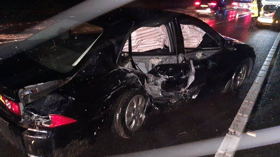 A3 two-car crash as wrong-way motorist turns around - BBC News