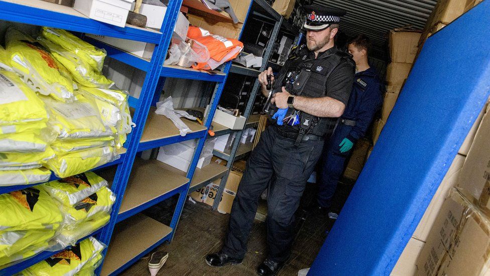 Police seize 70 tonnes of fake goods during Cheetham Hill raid - BBC News