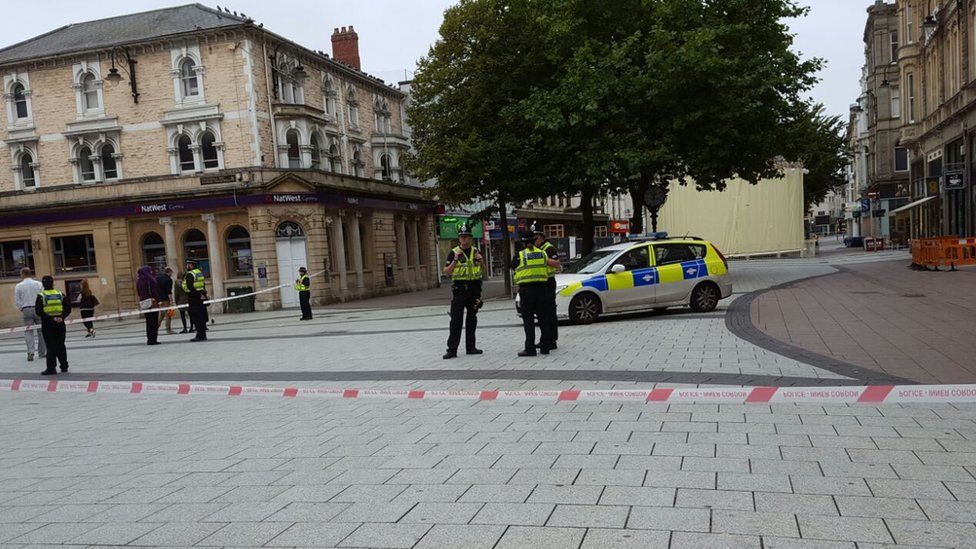 Cardiff Queen Street: Murder arrest after double stabbing - BBC News