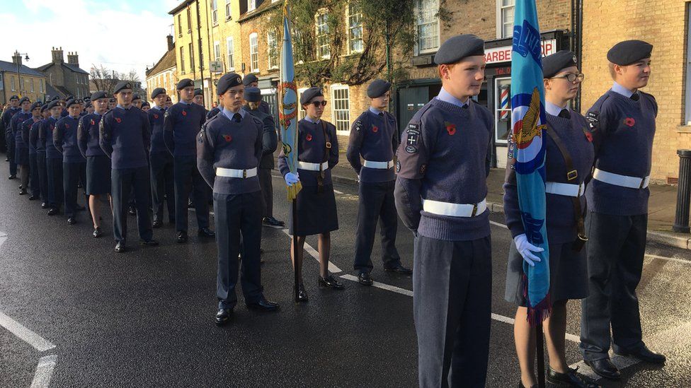 RAF cadets chip in to bring lost Ely hospital sign back - BBC News