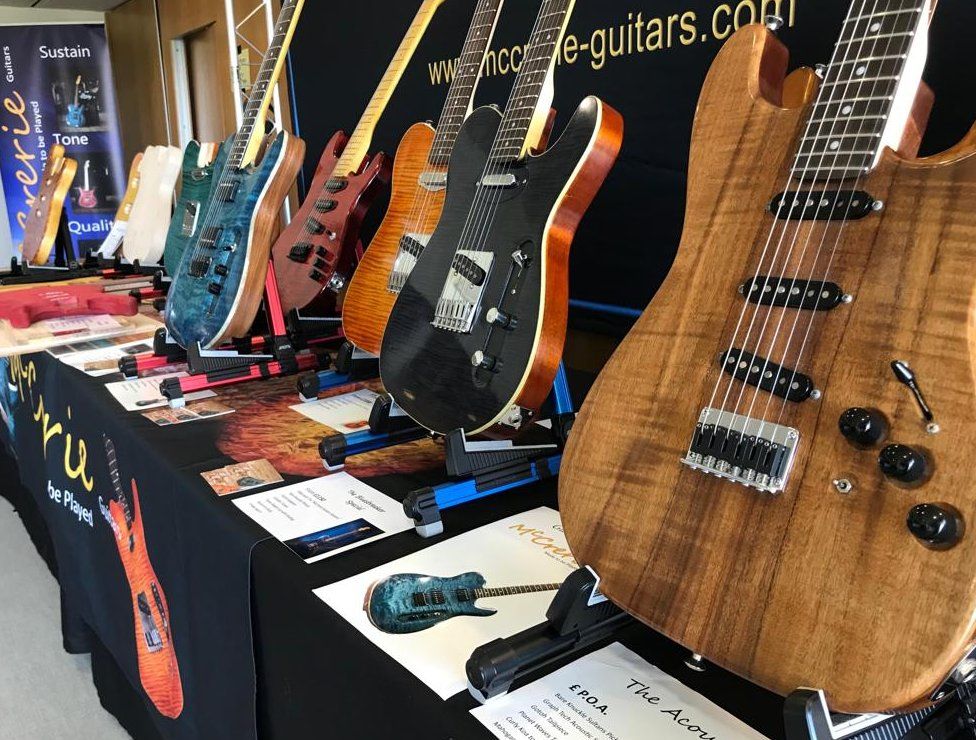 Cumbria Guitar Show: Pick of instruments on display - BBC News