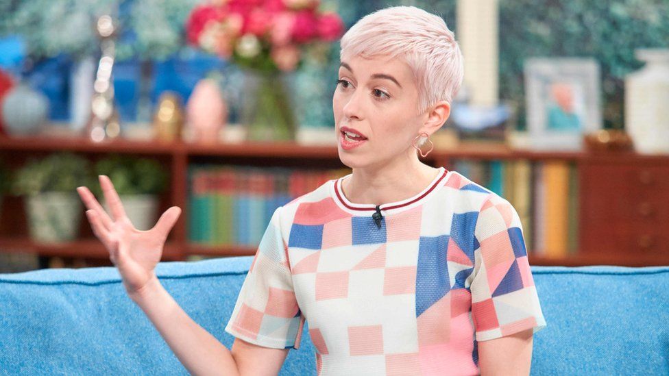 Eurovision: SuRie left 'bruised' after stage invasion - BBC News