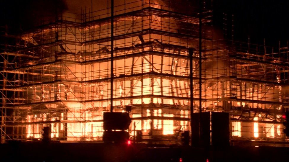 Huge blaze engulfs partly built Gorton flats - BBC News