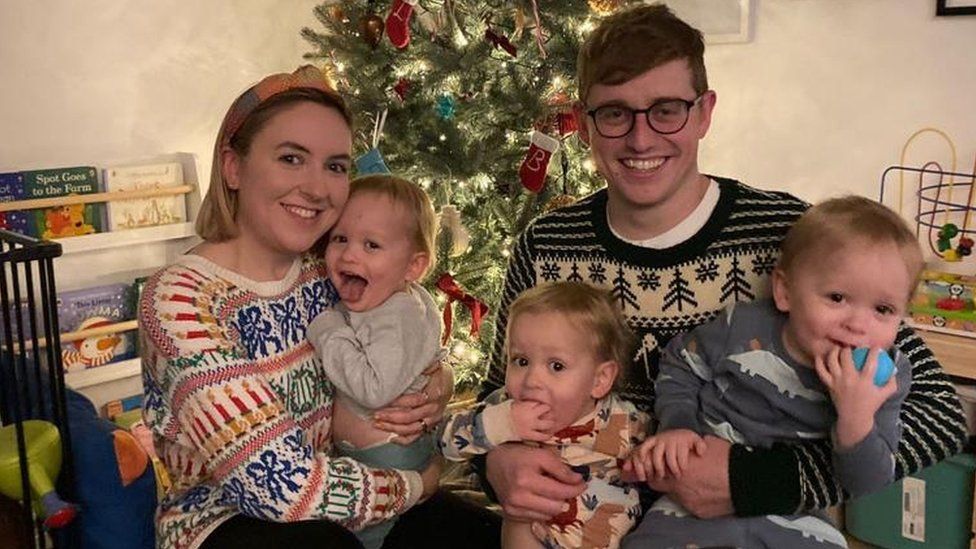 Premature identical triplets preparing for Christmas - BBC News