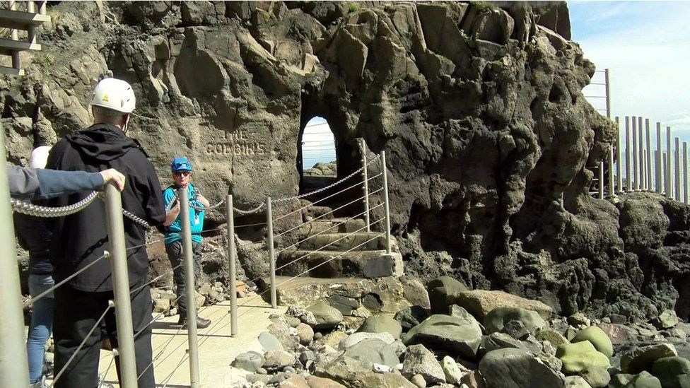 White-knuckle cliff walk along the Gobbins reopens - BBC News