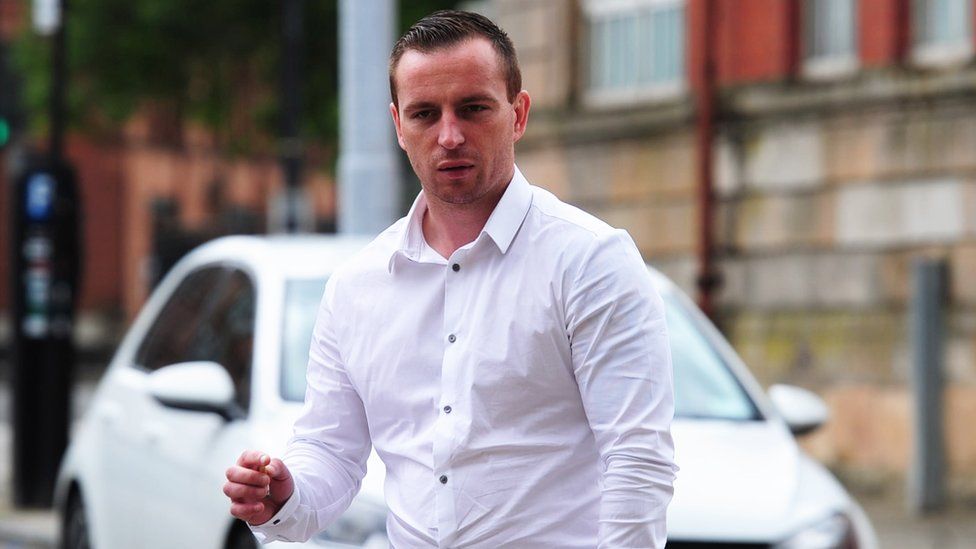 Man jailed for attacking brother's killer in the dock - BBC News