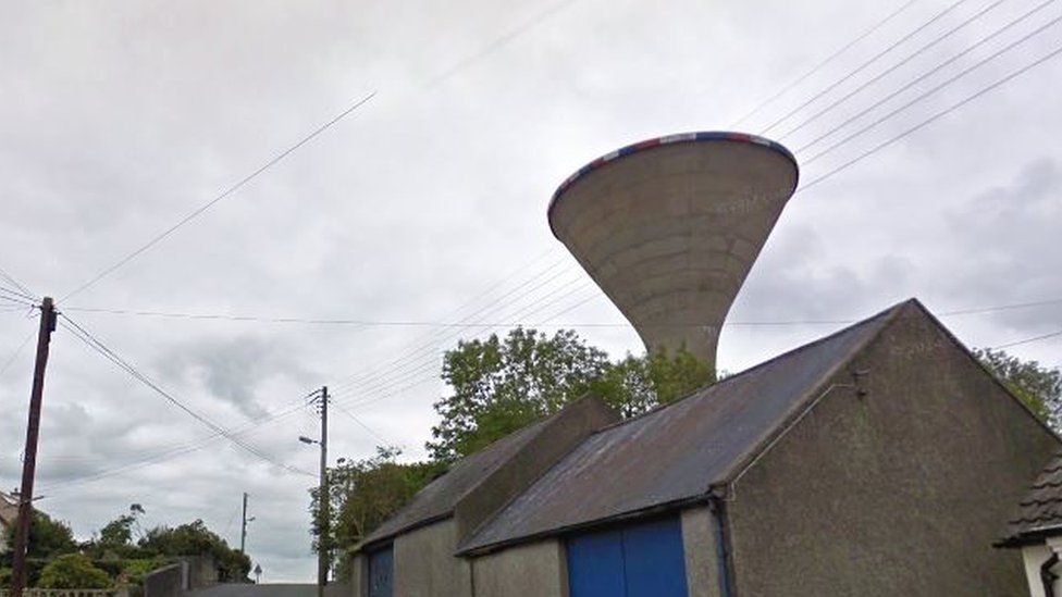 Rathfriland water tower has union flags removed - BBC News