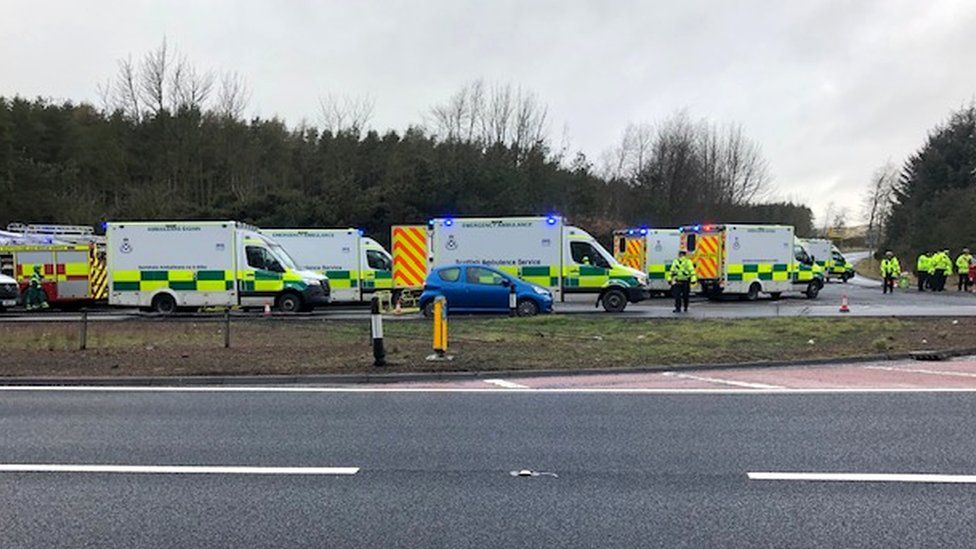 Man dies in A90 crash between bus and van - BBC News