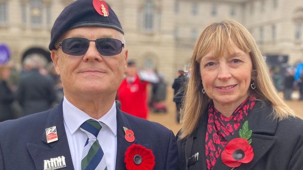 Blind Rugby veteran joins Remembrance march at Cenotaph - BBC News
