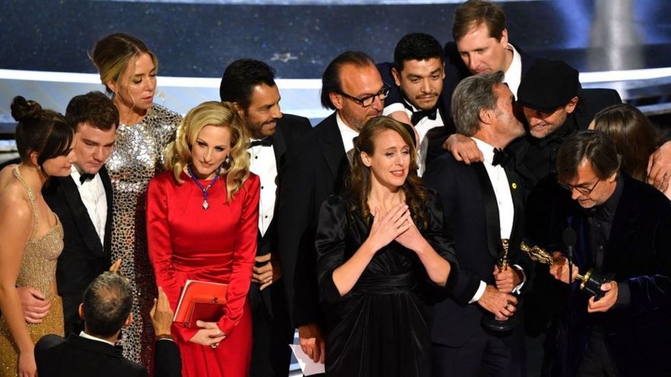Will Smith hits Chris Rock on Oscars stage - BBC News
