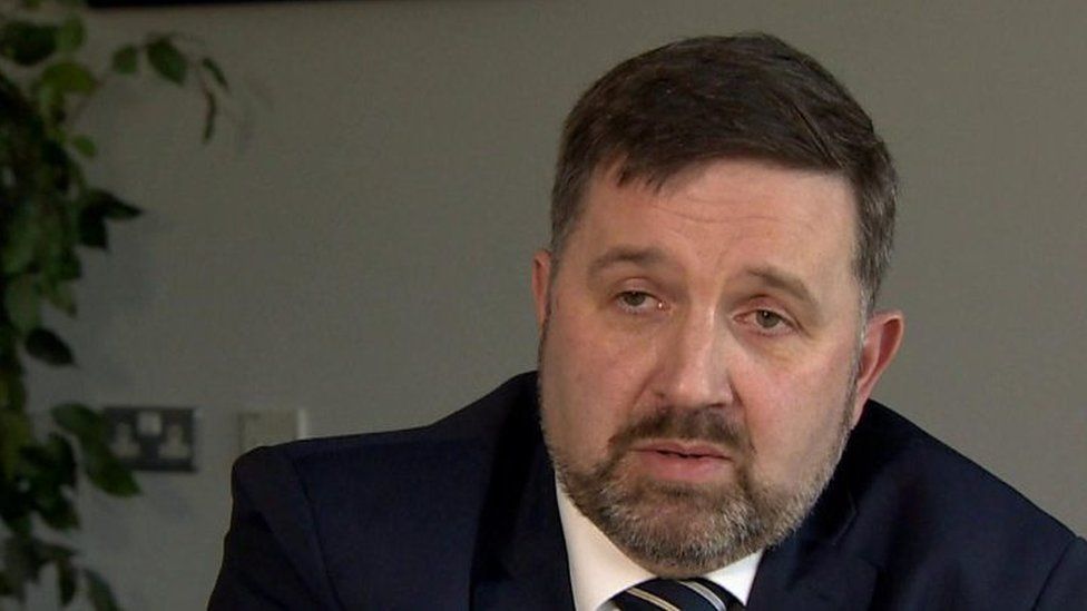 Health Minister Robin Swann says he needs £661m - BBC News