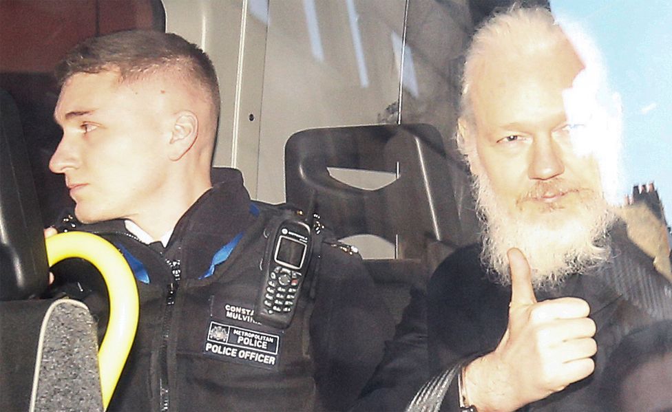 Newspaper headlines: Julian Assange 'tug of war' - BBC News
