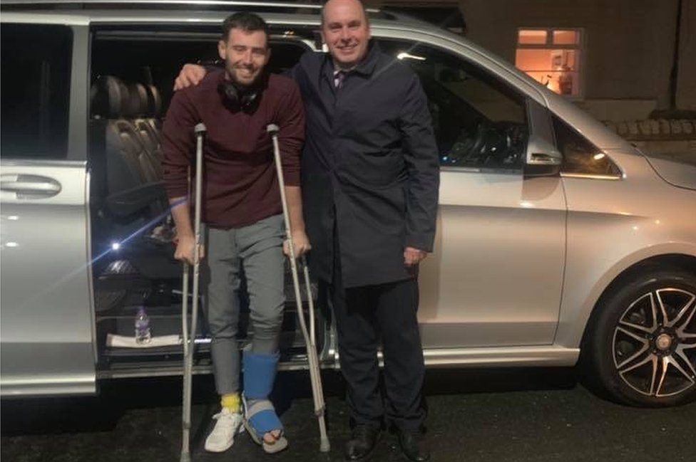 Injured cyclist Josh Quigley returns home to Scotland - BBC News