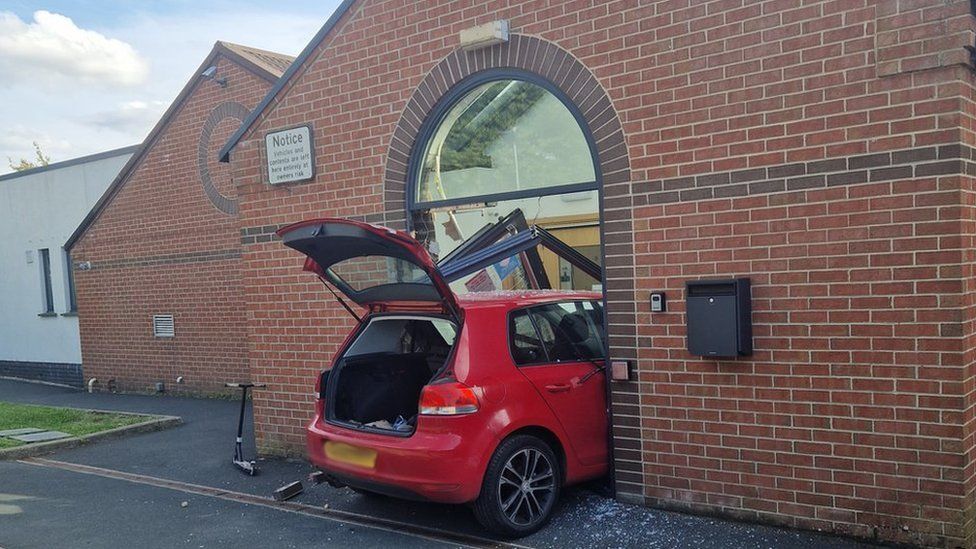 Hilton: Car crashes through front doors of village hall - BBC News