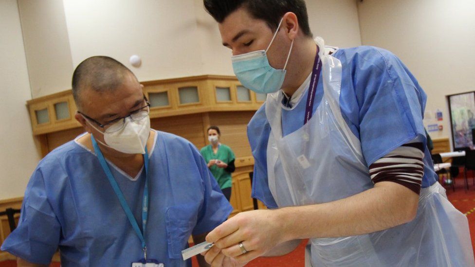 Covid Jonathan Van Tam Gives Out Vaccination Jabs Bbc News