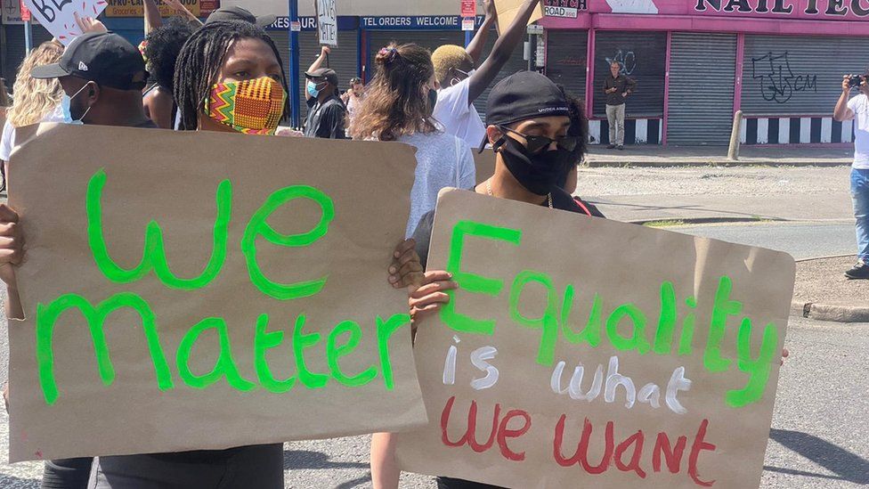 K-Dogg: BLM march held after Bristol race attack - BBC News