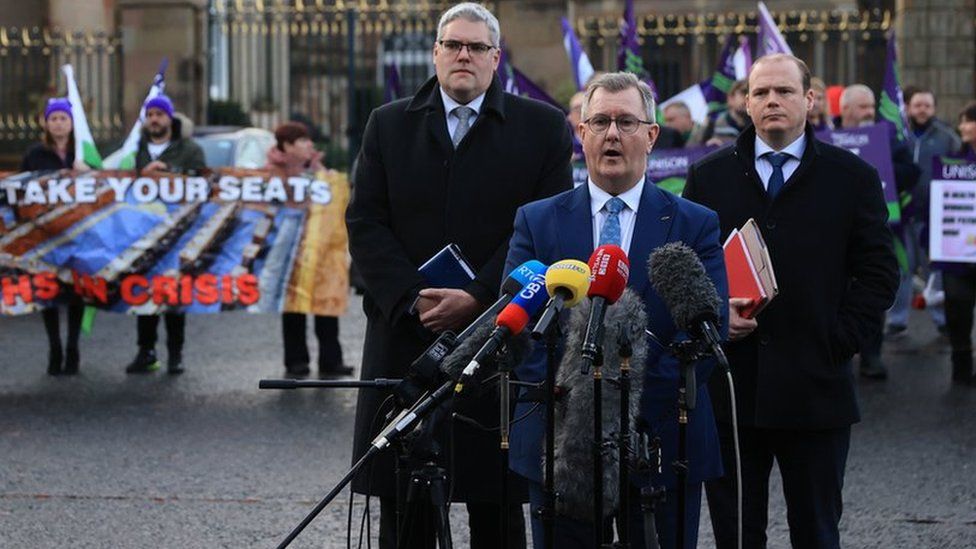 TUV members put up 'sell-out' posters - Allister - BBC News