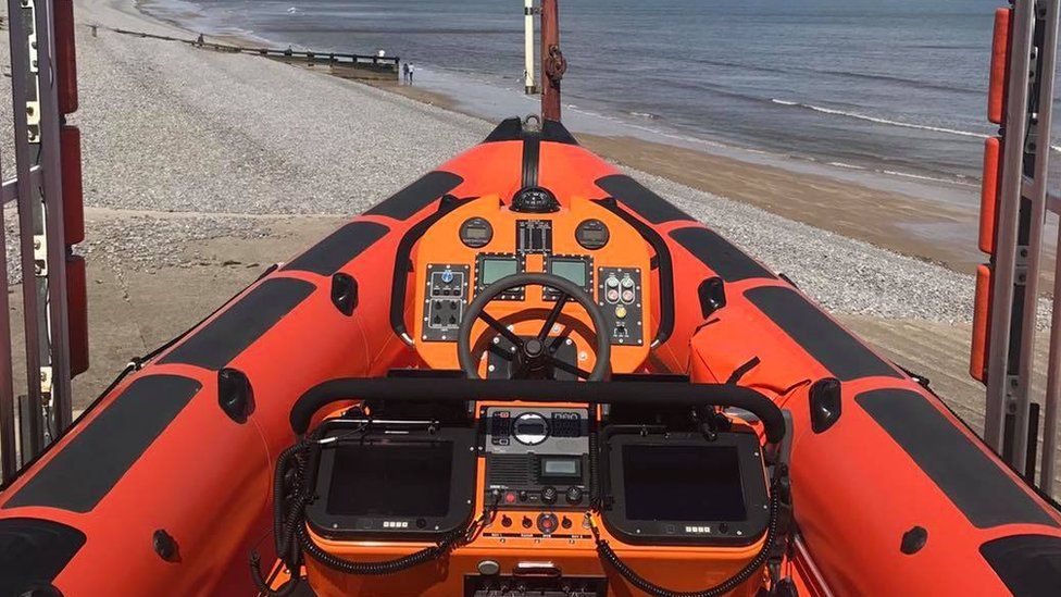 Norfolk man thanks RNLI 50 years after being saved at sea - BBC News