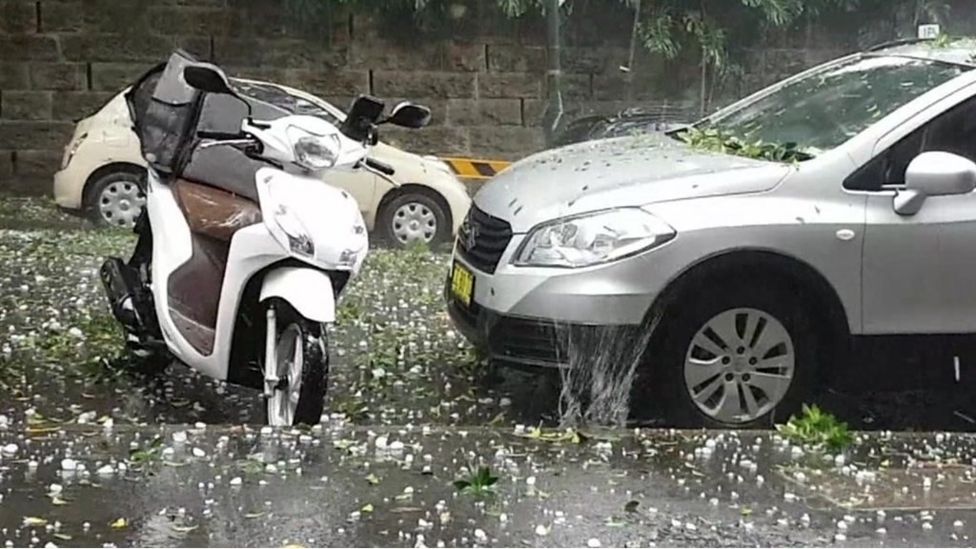 India capital Delhi enjoys unusual hail storm - BBC News