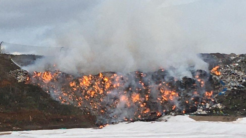 Ling Hall fire: Crews 'suppressing' landfill site - BBC News