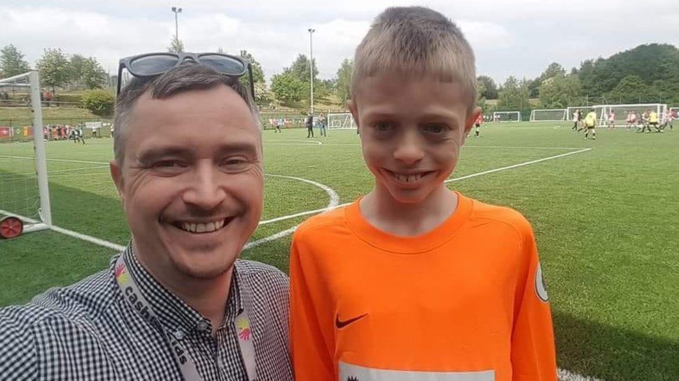 Son's goalkeeping debut for Sheffield team video goes viral - BBC News
