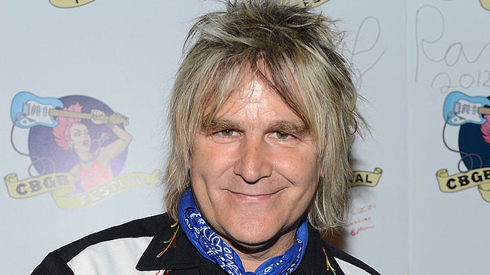 New Year Honours: Alarm singer Mike Peters awarded MBE - BBC News
