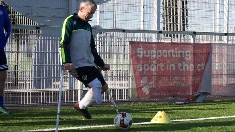 Amputee goalkeeper defies odds to bring team to victory - BBC News