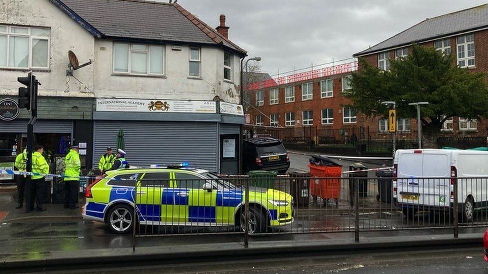 Cardiff courier dragged under stolen van critically ill - BBC News